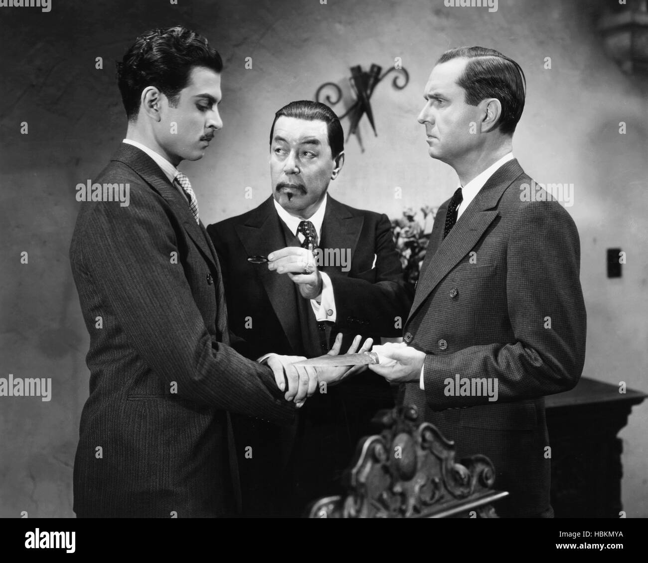 CHARLIE CHAN'S SECRET, from left: Edward Trevor, Warner Oland, Ivan ...