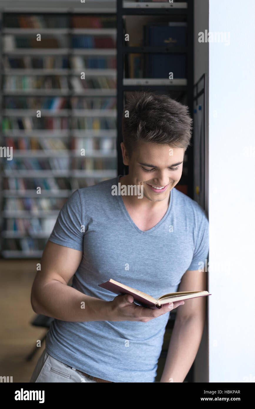 Man in library Stock Photo - Alamy