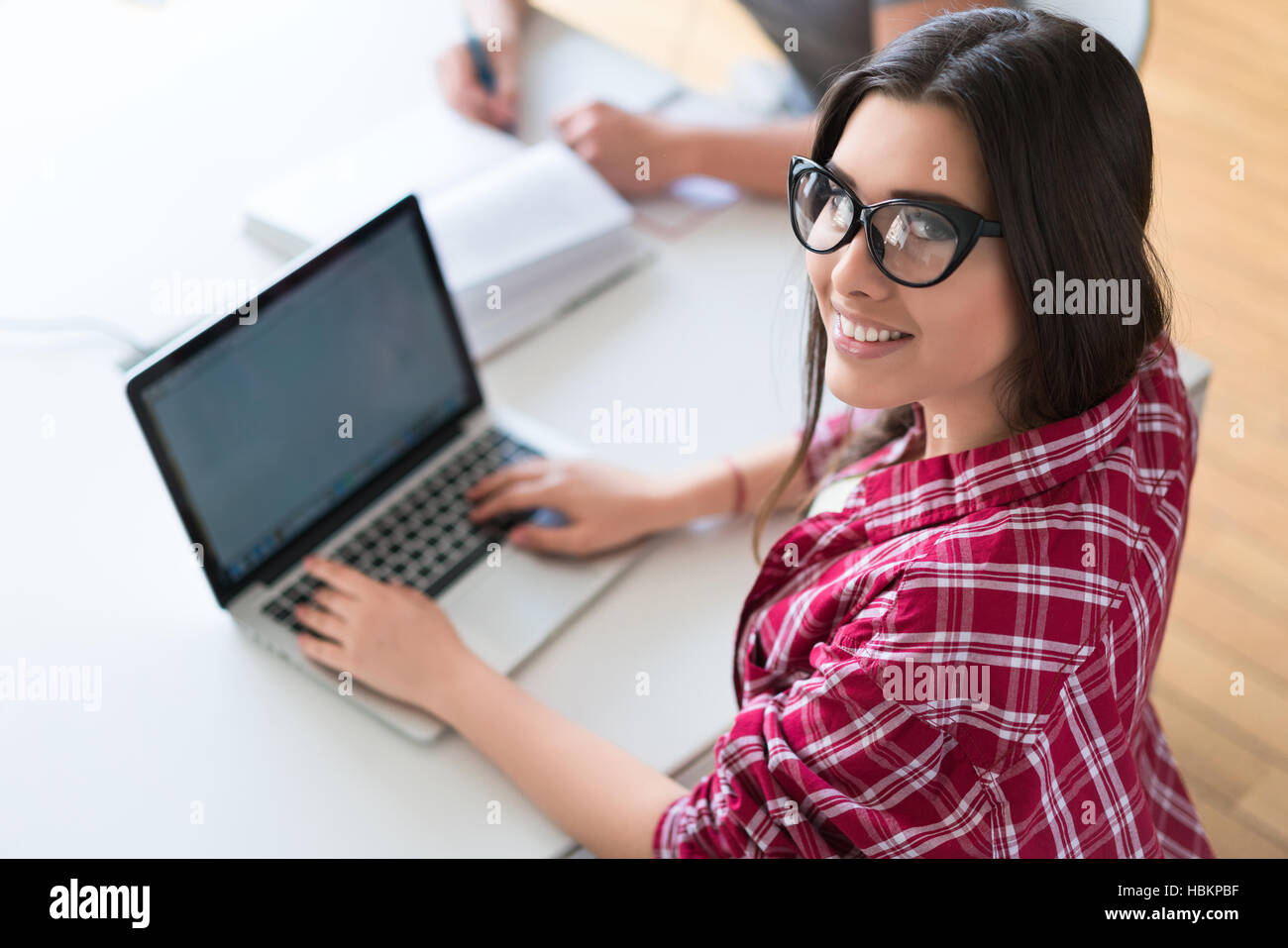 Student with laptop Stock Photo - Alamy
