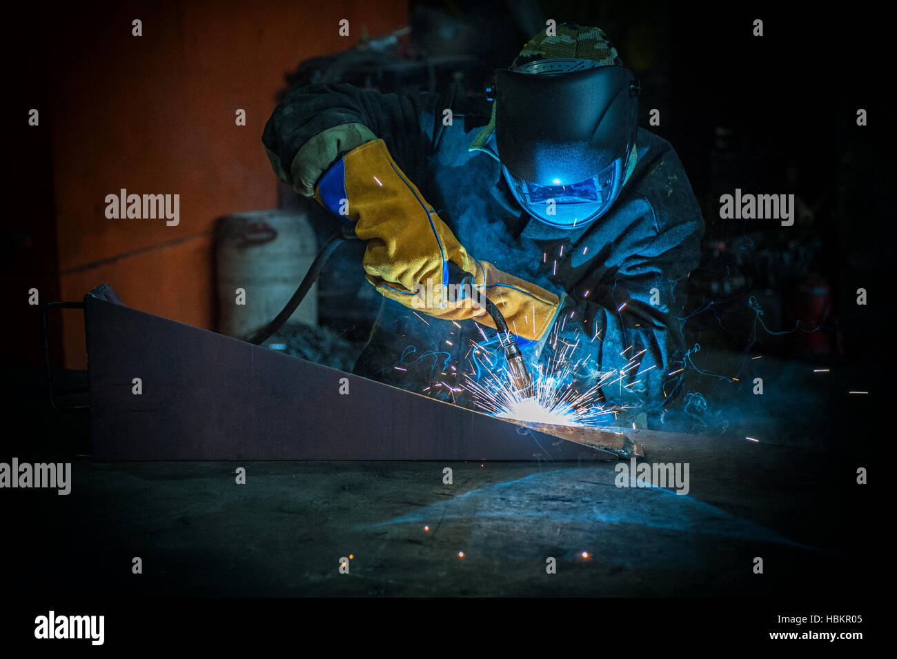 worker welding metal Stock Photo - Alamy