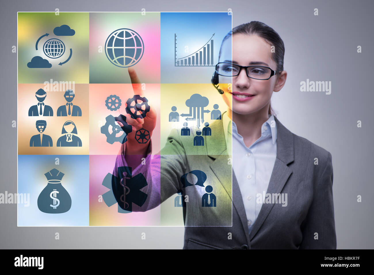 Woman pressing buttons in business concept Stock Photo - Alamy