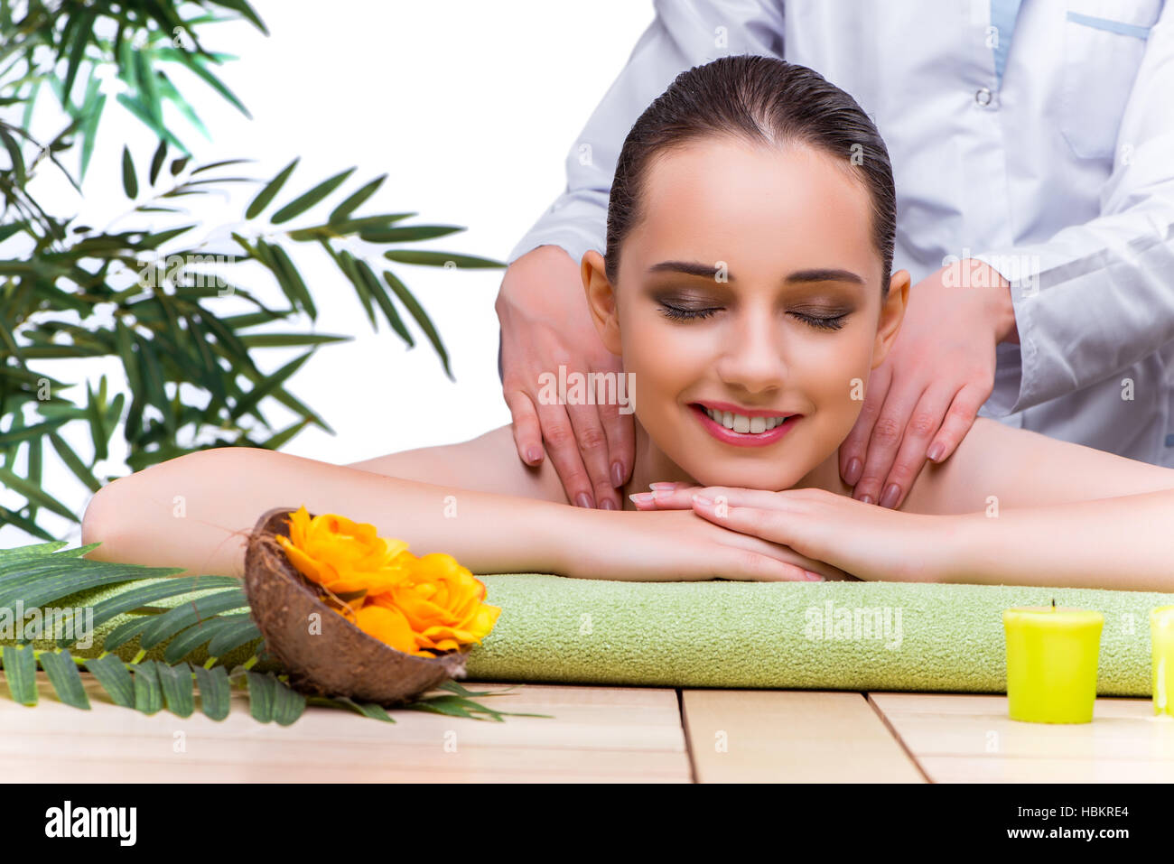 Woman during massage session in spa salon Stock Photo - Alamy