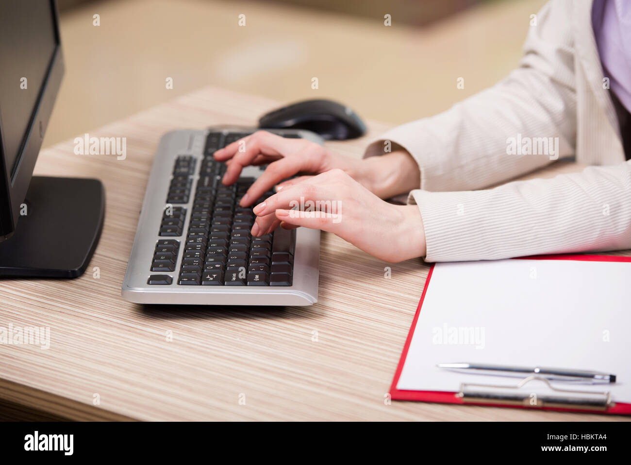 Hands working on the keyboard in the office Stock Photo - Alamy