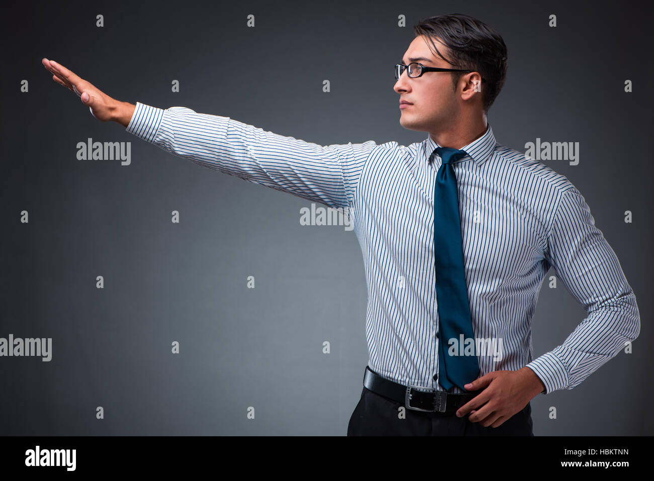 Handsome businessman pressing virtual buttons Stock Photo - Alamy