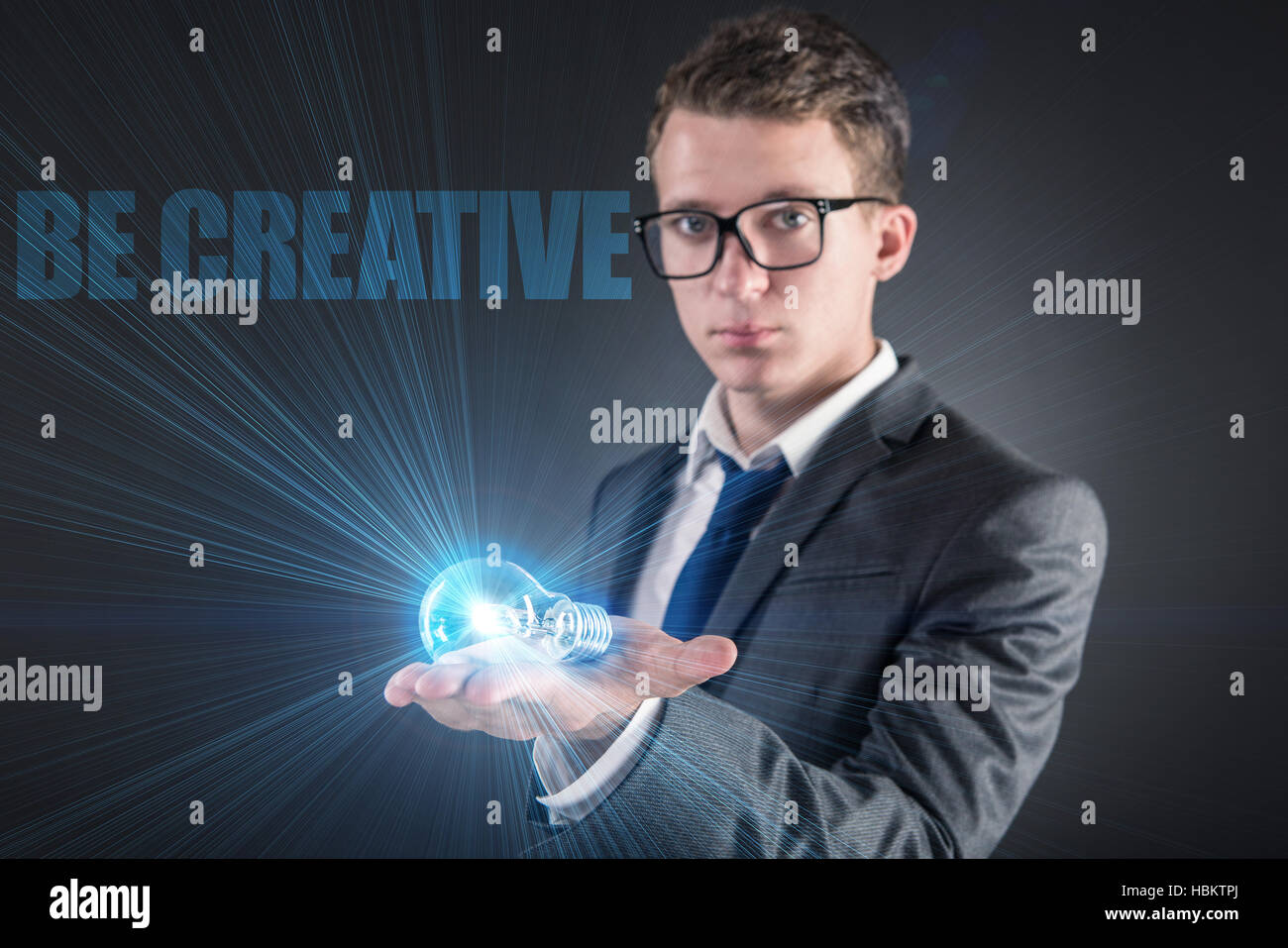 Young man in creative idea concept Stock Photo - Alamy