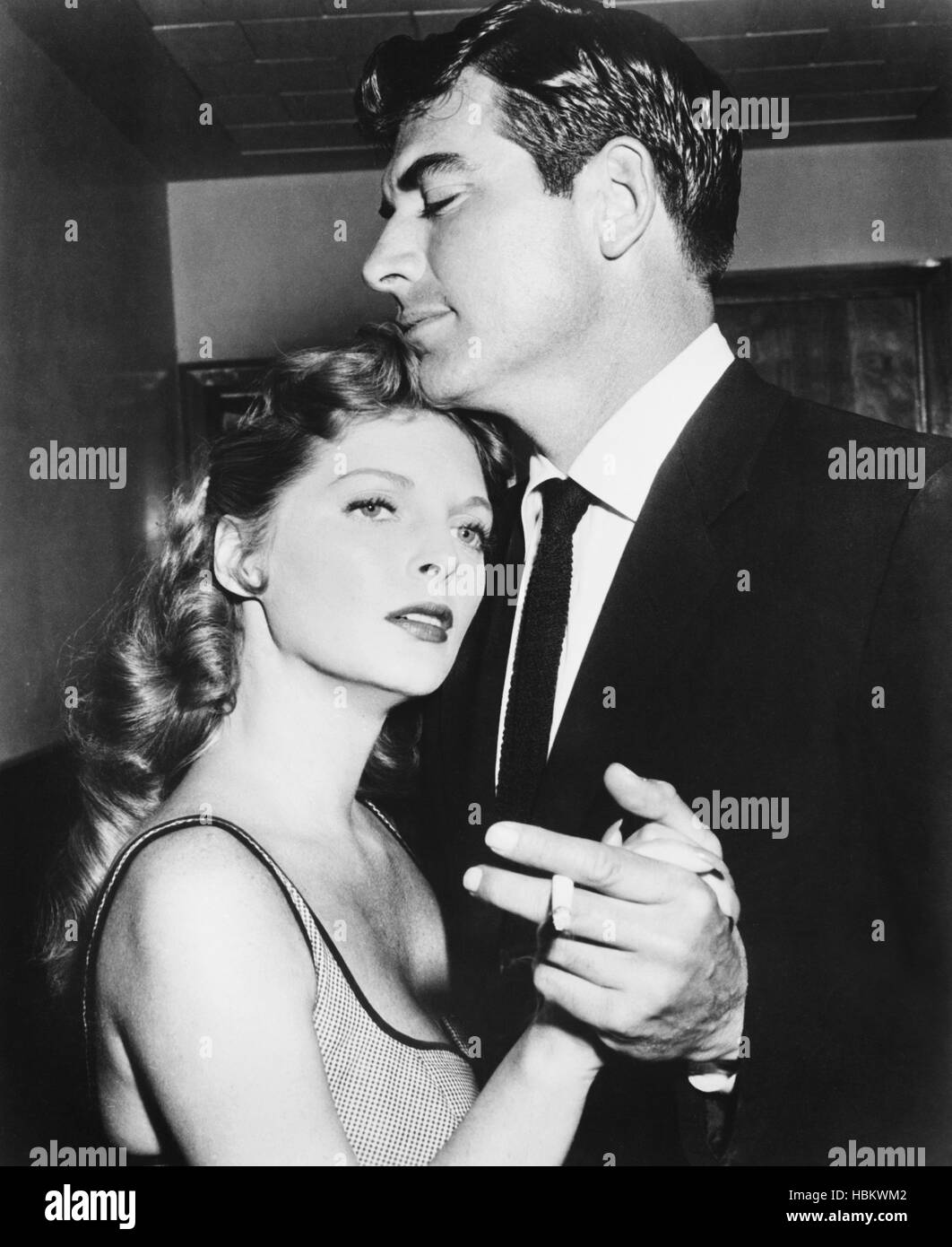CRIME AGAINST JOE, from left: Julie London, John Bromfield, 1956 Stock ...