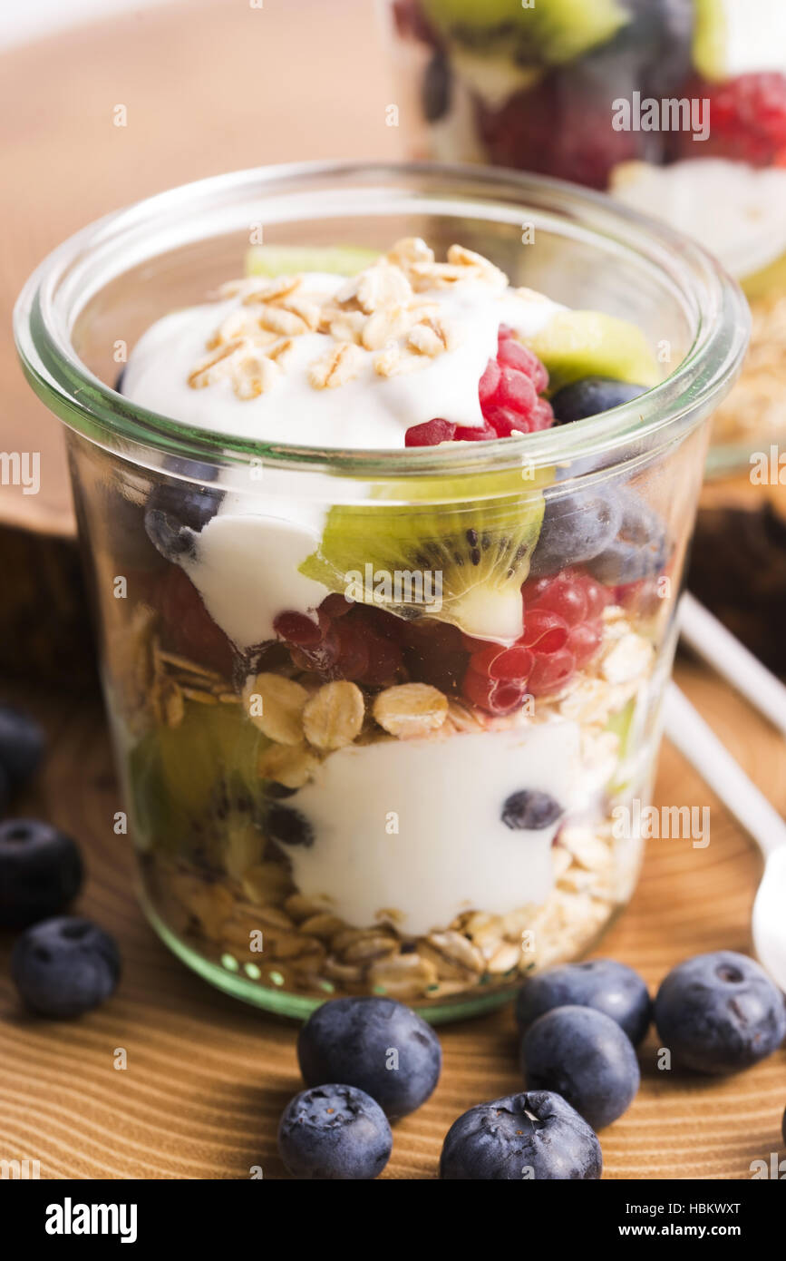 musli served with joghurt and fresh fruits Stock Photo - Alamy