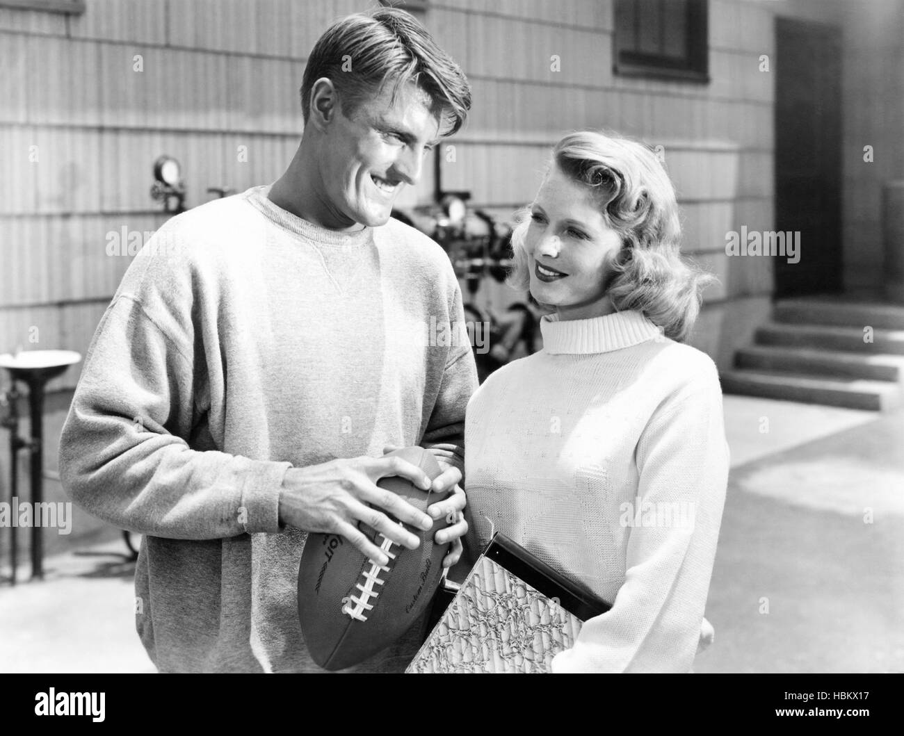 CRAZYLEGS, from left: Elroy 'Crazylegs' Hirsch, Joan Vohs, 1953 Stock Photo - Alamy