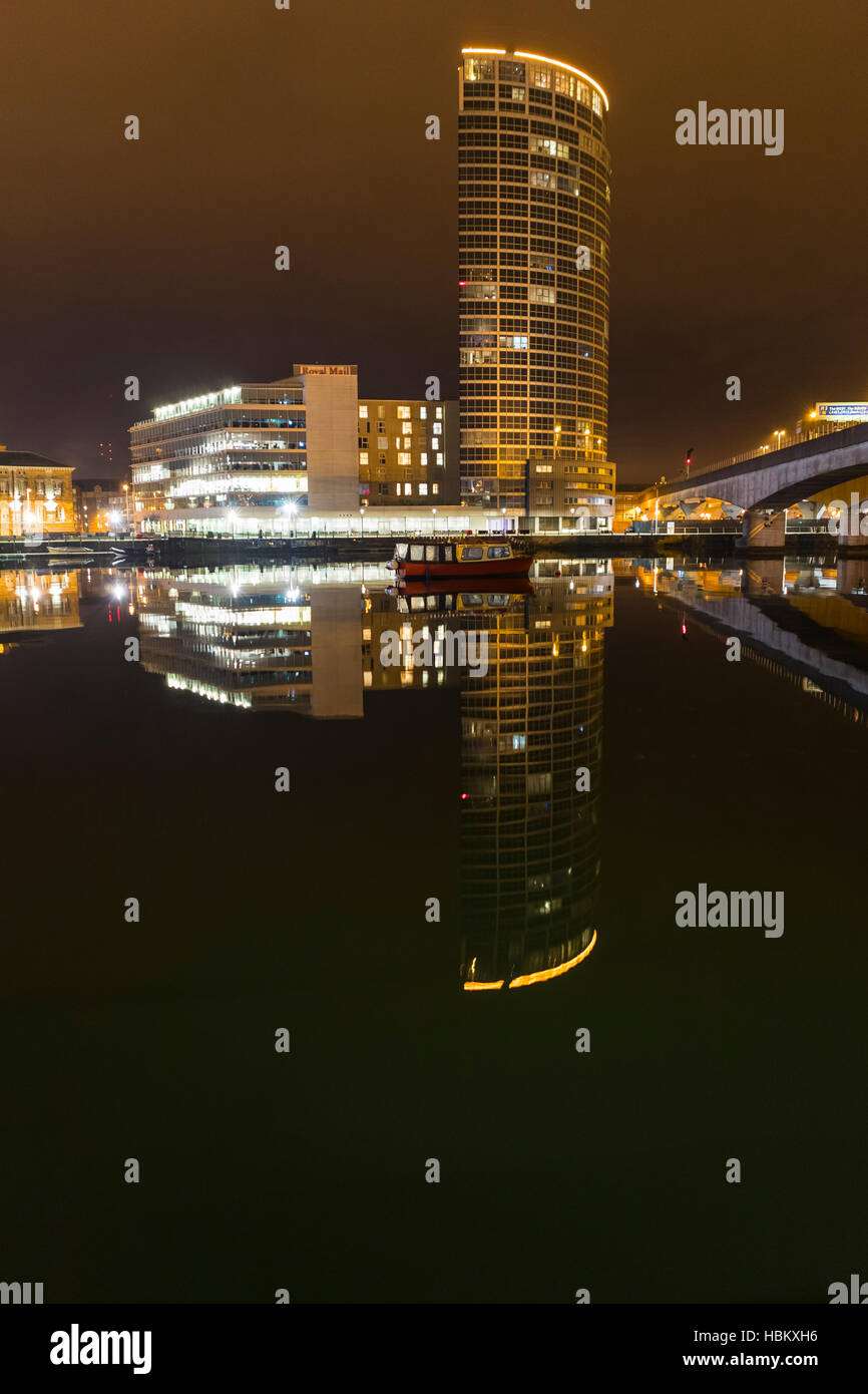 The Obel Tower and River Lagan at night. Belfast, Northern Ireland ...