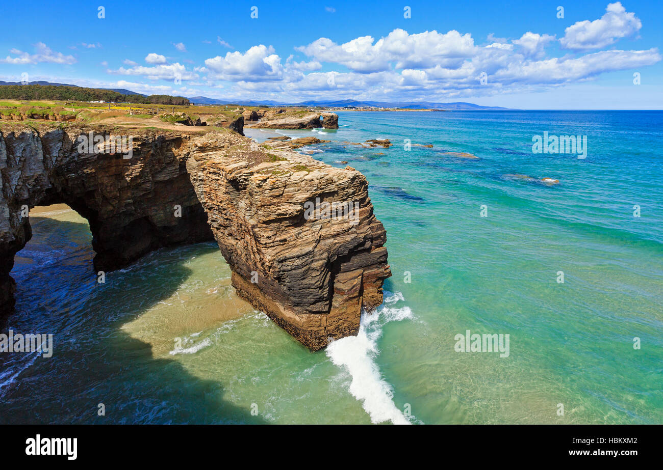 Natural arches on beach Stock Photo - Alamy