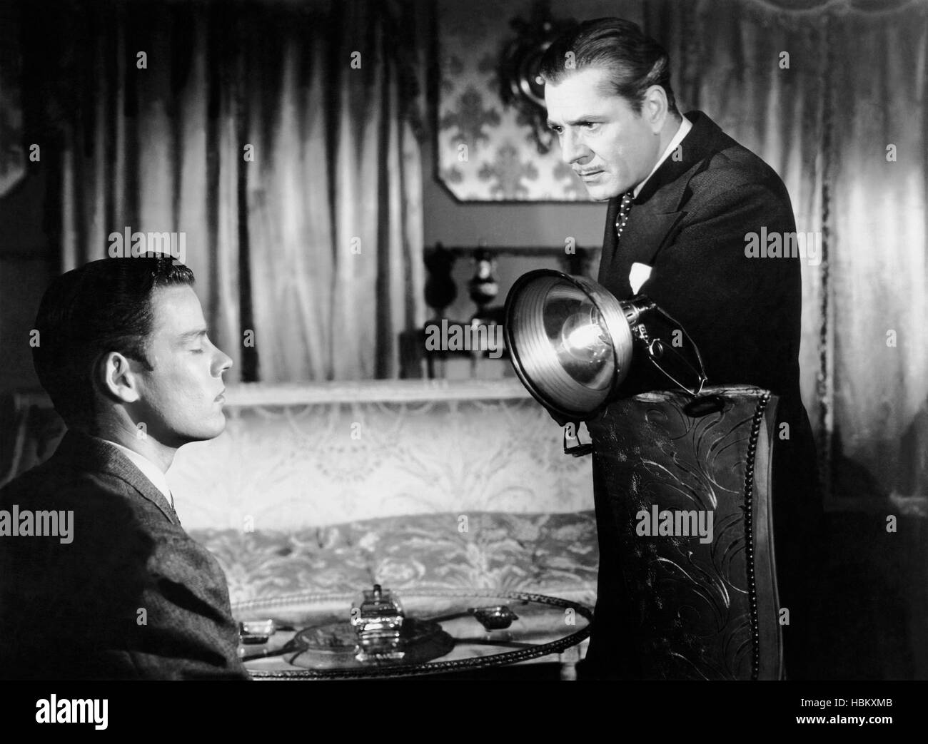 THE CRIME DOCTOR'S WARNING, from left, Coulter Irwin, Warner Baxter ...