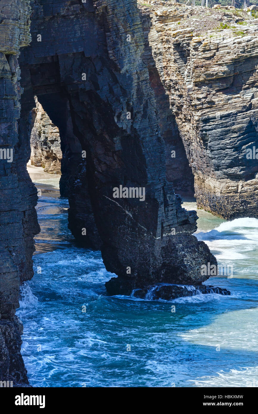 Natural arches on beach Stock Photo - Alamy