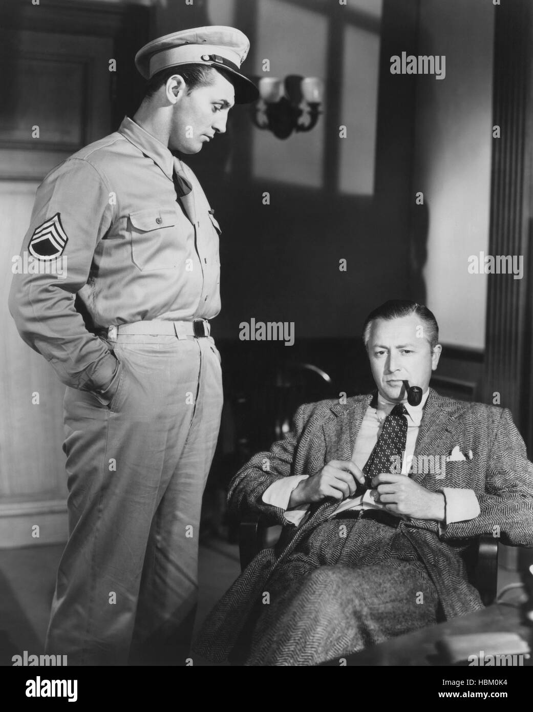 CROSSFIRE, from left: Robert Mitchum, Robert Young, 1947 Stock Photo ...