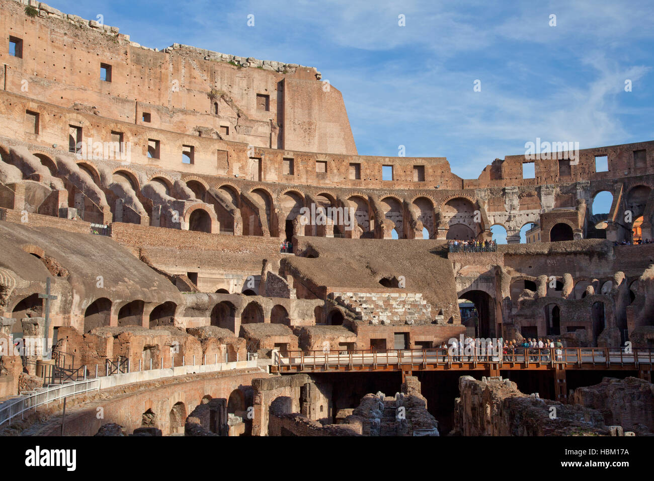 Rome, Colosseum, amphitheatre interior with tourists on viewing ...