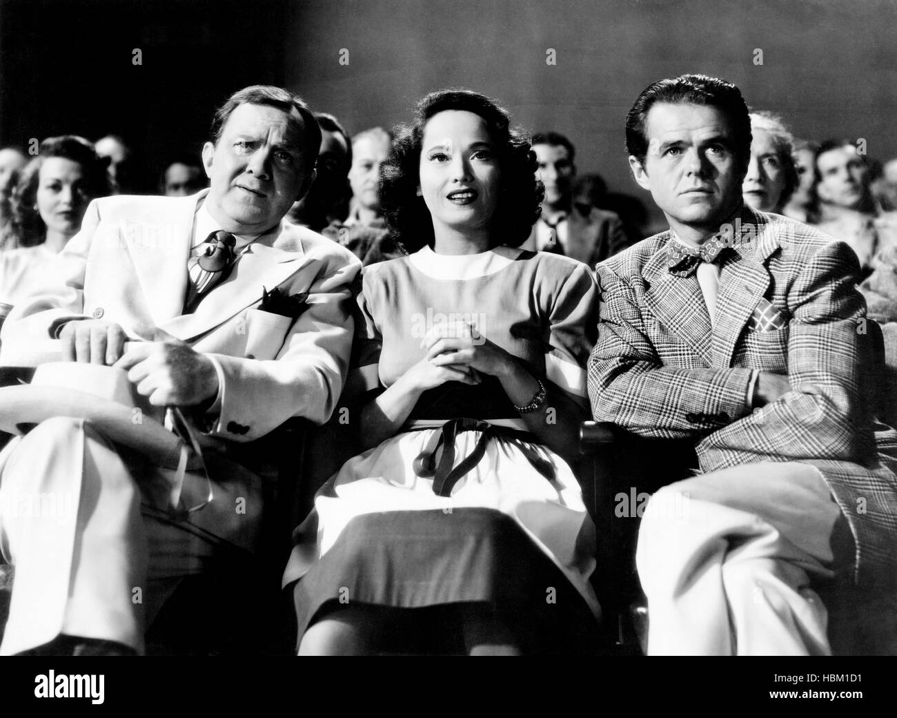 DARK WATERS, from left, Thomas Mitchell, Merle Oberon, Elisha Cook, Jr., 1944 Stock Photo - Alamy