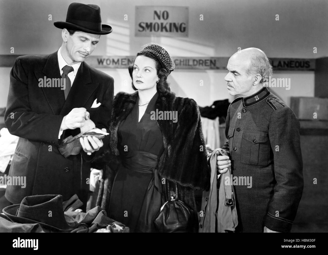 DEVIL'S CARGO, from left, John Calvert, Rochelle Hudson, Michael Mark, 1948 Stock Photo - Alamy