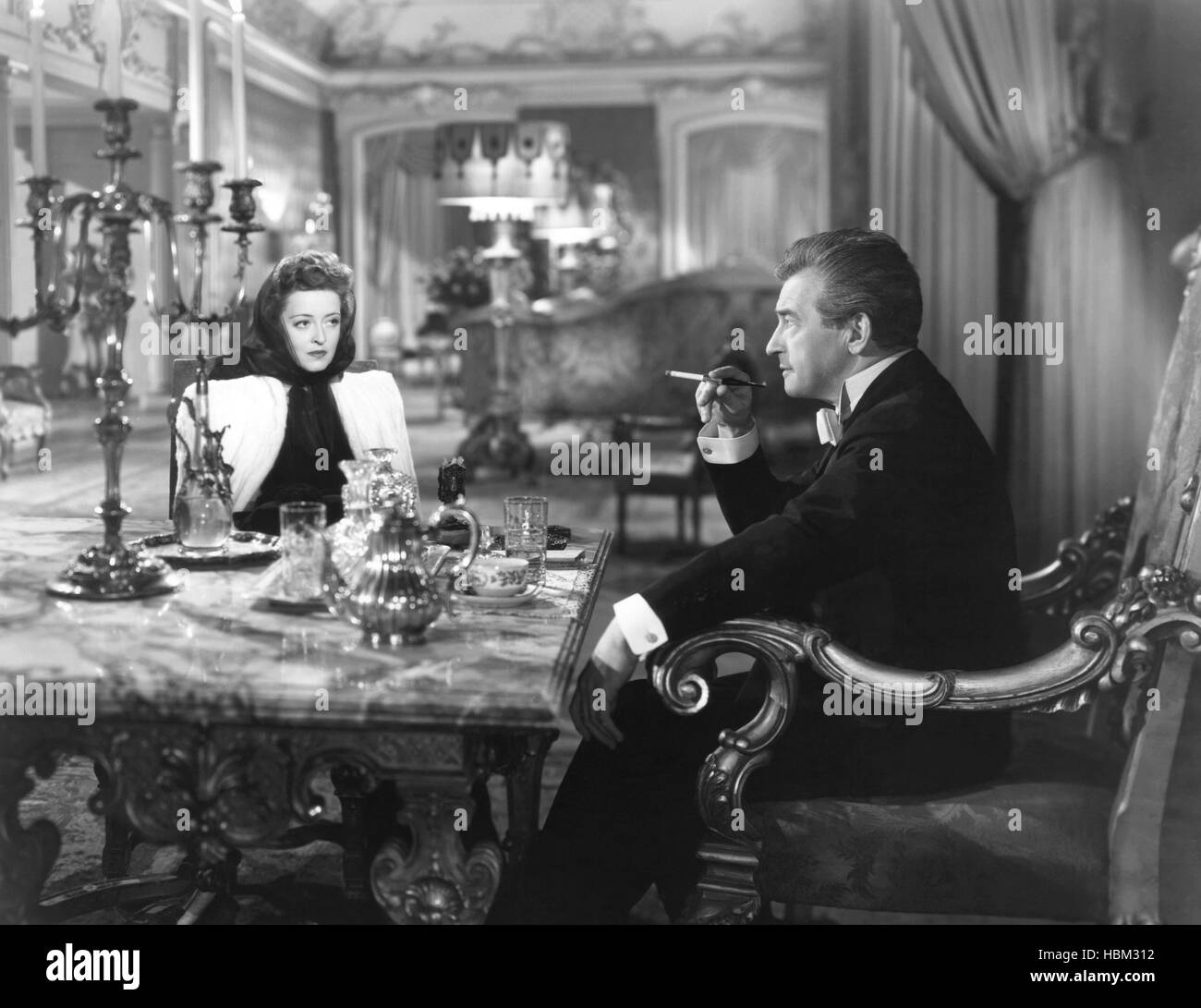 DECEPTION, from left: Bette Davis, Claude Rains, 1946 Stock Photo - Alamy