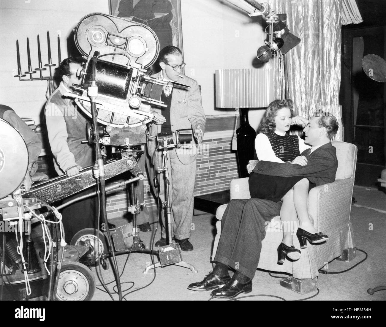 DECEPTION, director Irving Rapper (left); Bette Davis, Paul Henreid ...