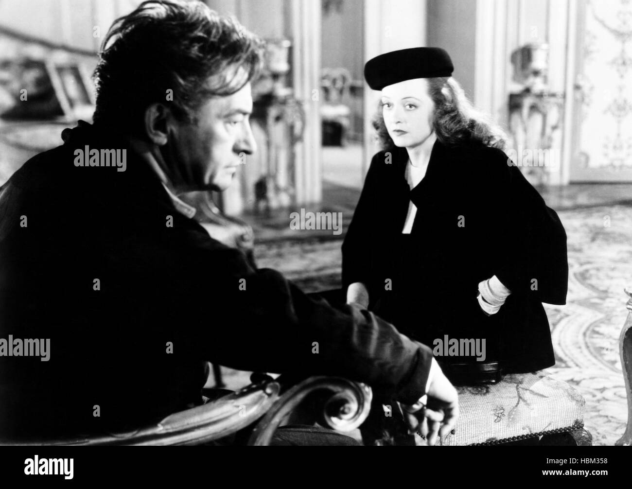DECEPTION, from left: Claude Rains, Bette Davis, 1946 Stock Photo - Alamy