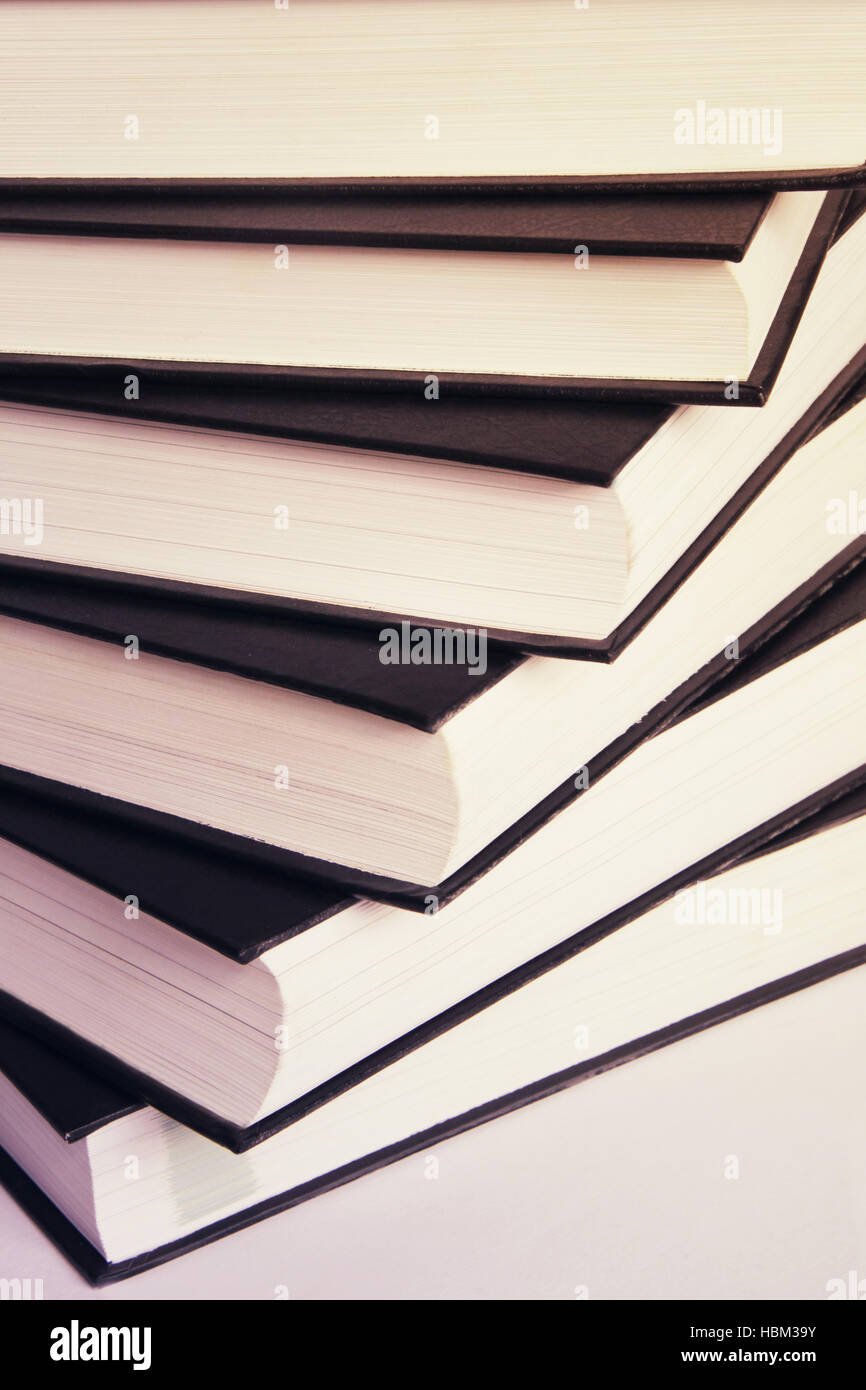 Books pattern isolated on white Stock Photo - Alamy