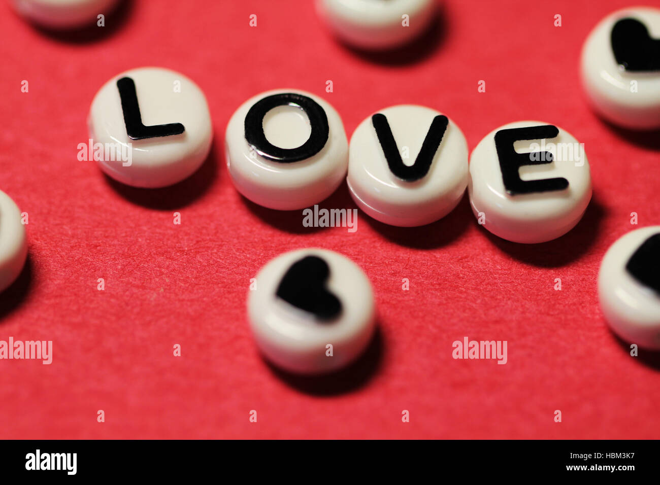 Love text written hearts hi-res stock photography and images - Alamy