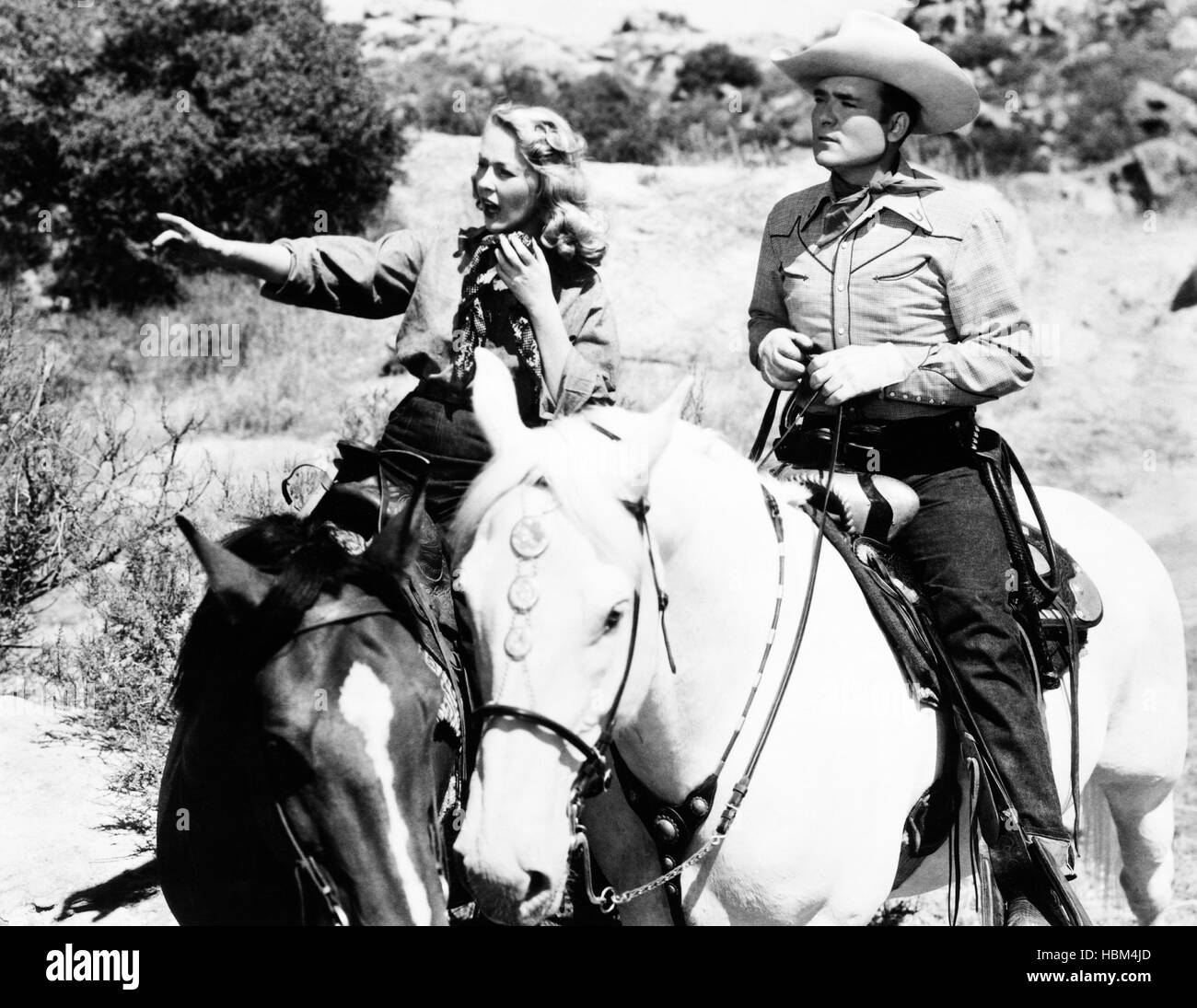 CHEROKEE UPRISING, from left: Lois Hall, Whip Wilson, 1950 Stock Photo ...