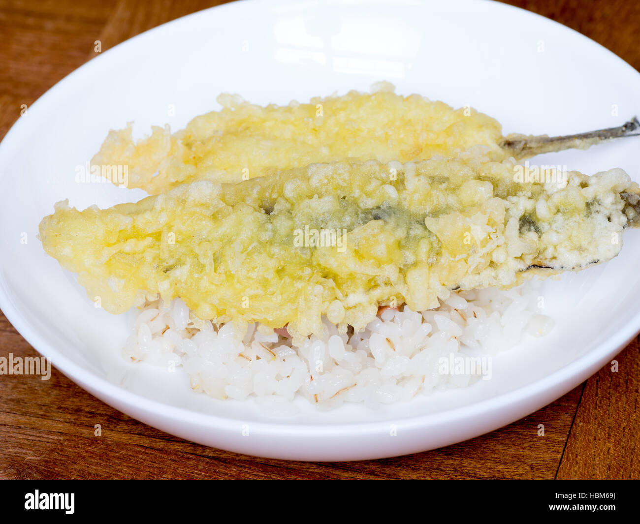 Japanese cuisine, fried fish on the rice called a Tendon in Japanese on ...