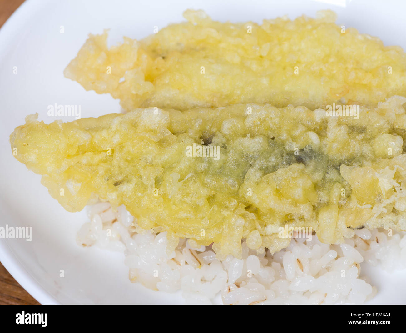 Japanese cuisine, fried fish on the rice called a Tendon in Japanese on ...