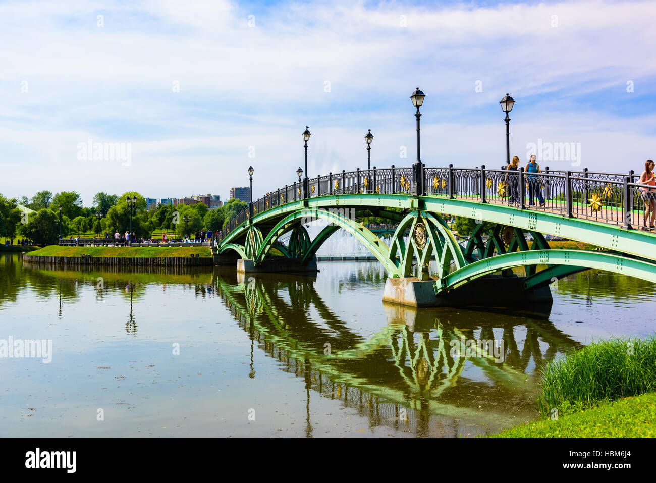 pedestrian iron bridge over the river Stock Photo - Alamy