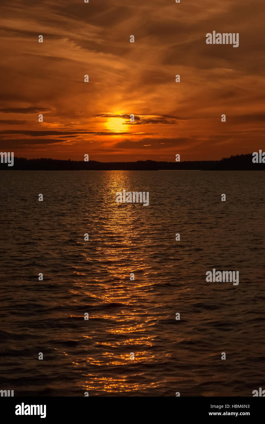 Sunset on the lake Stock Photo - Alamy