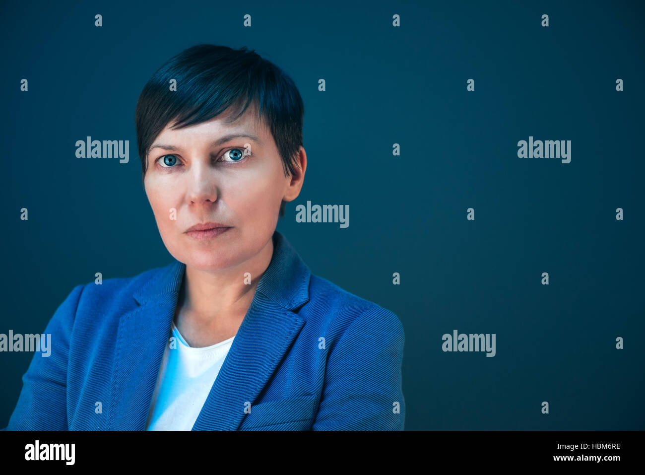 Serious female in elegant suit hi-res stock photography and images - Alamy