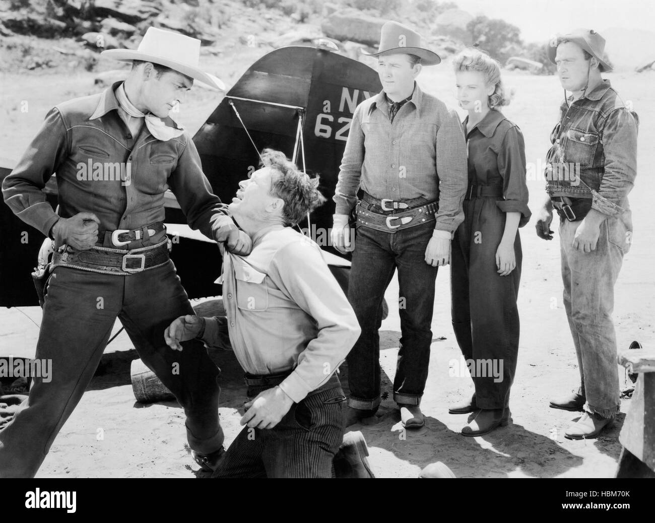 COWBOY IN THE CLOUDS, from left: Charles Starrett, Hal Taliaferro ...