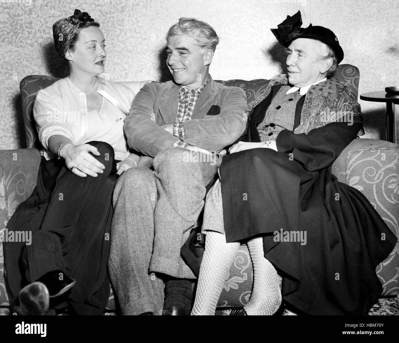THE CORN IS GREEN, from left, star Bette Davis, author Emlyn Williams ...