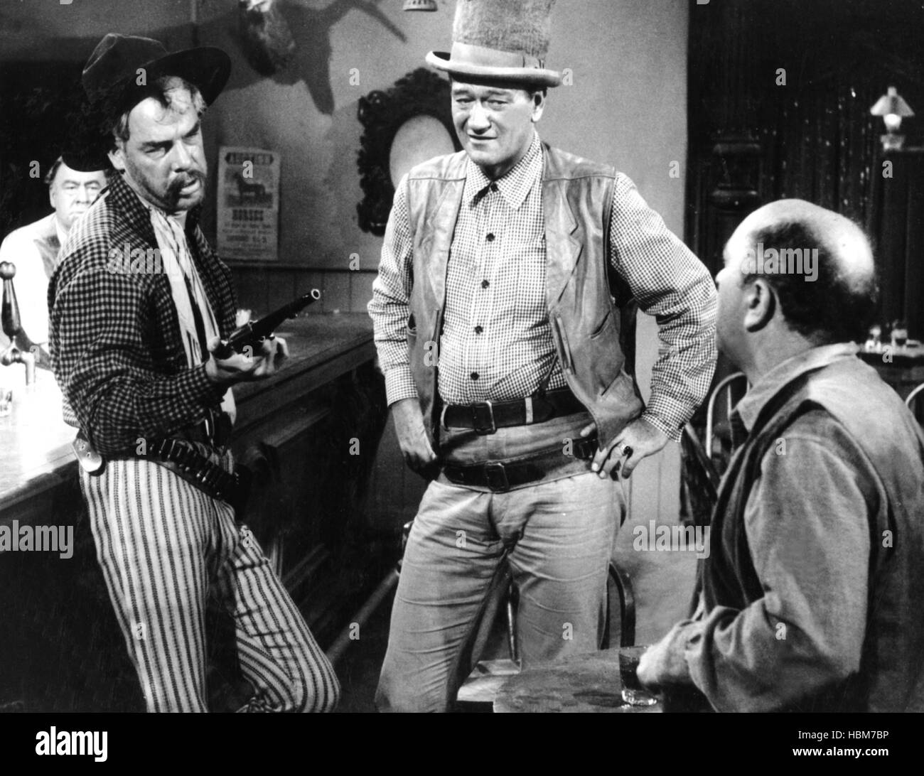 THE COMANCHEROS, from left: Alan Carney, Lee Marvin, John Wayne ...