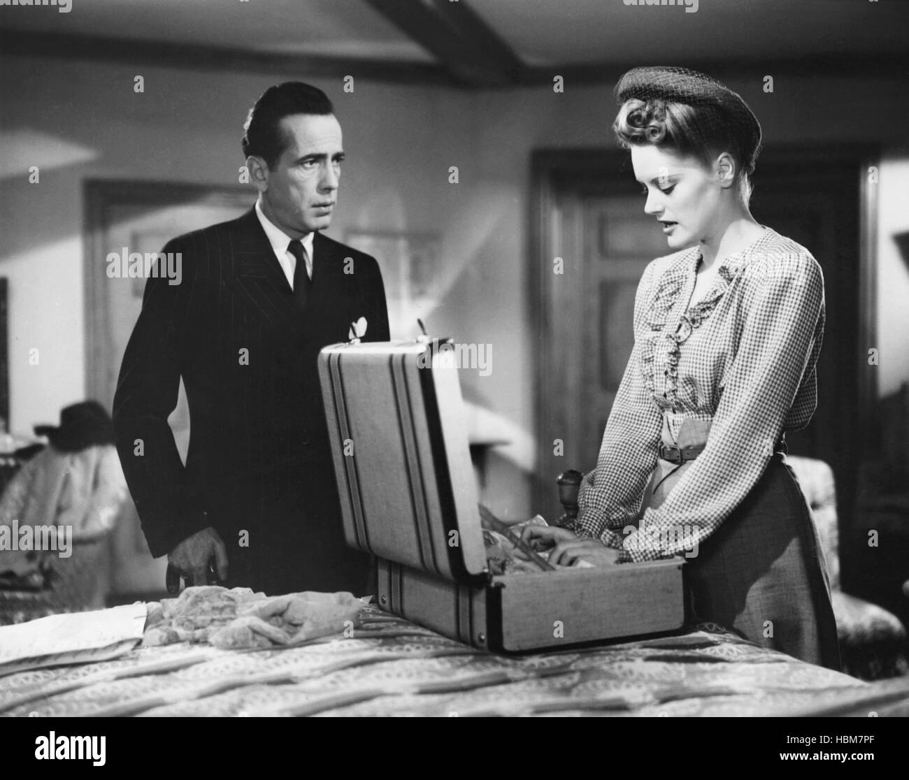 CONFLICT, from left: Humphrey Bogart, Alexis Smith, 1945 Stock Photo ...