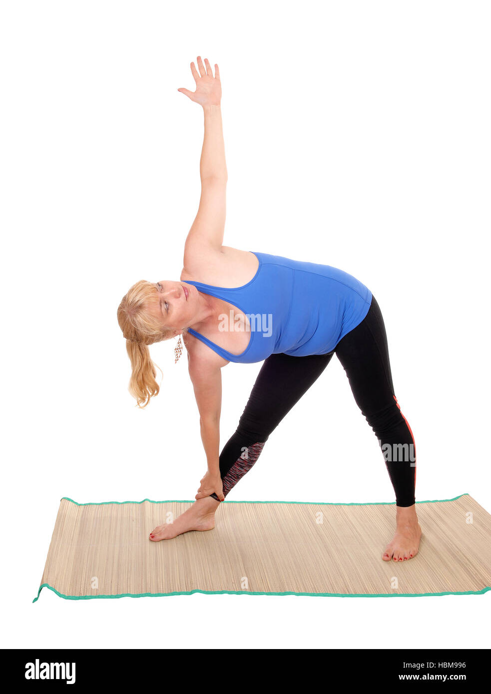 Yoga trainer showing poses Stock Photo - Alamy