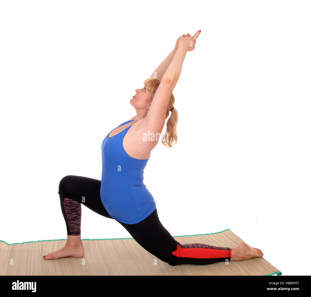 Yoga trainer showing stretching Stock Photo - Alamy