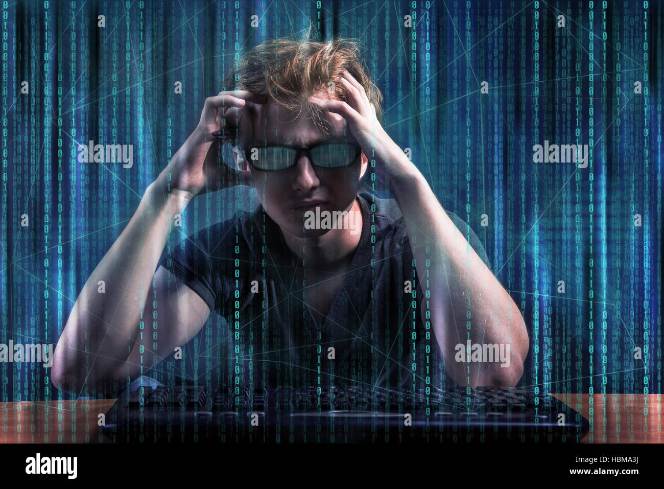 Young hacker in digital security concept Stock Photo - Alamy