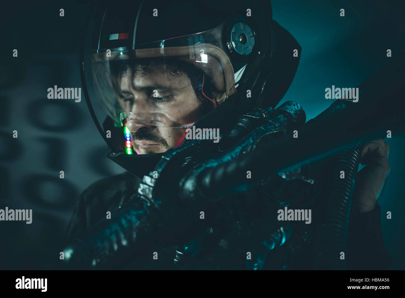 Space man with metal helmet and laser beam weapon Stock Photo - Alamy