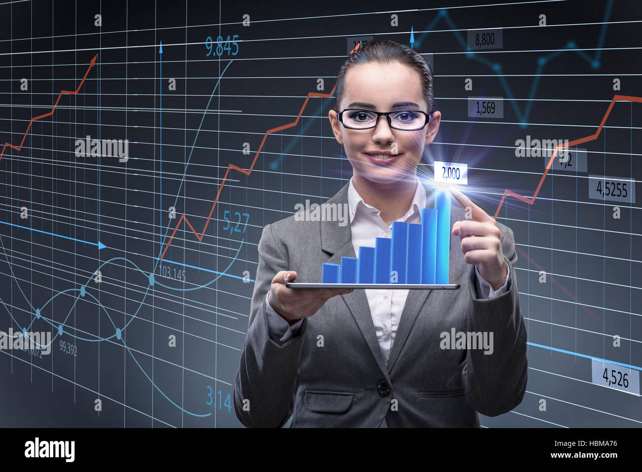 Businesswoman in stock trading concept Stock Photo - Alamy