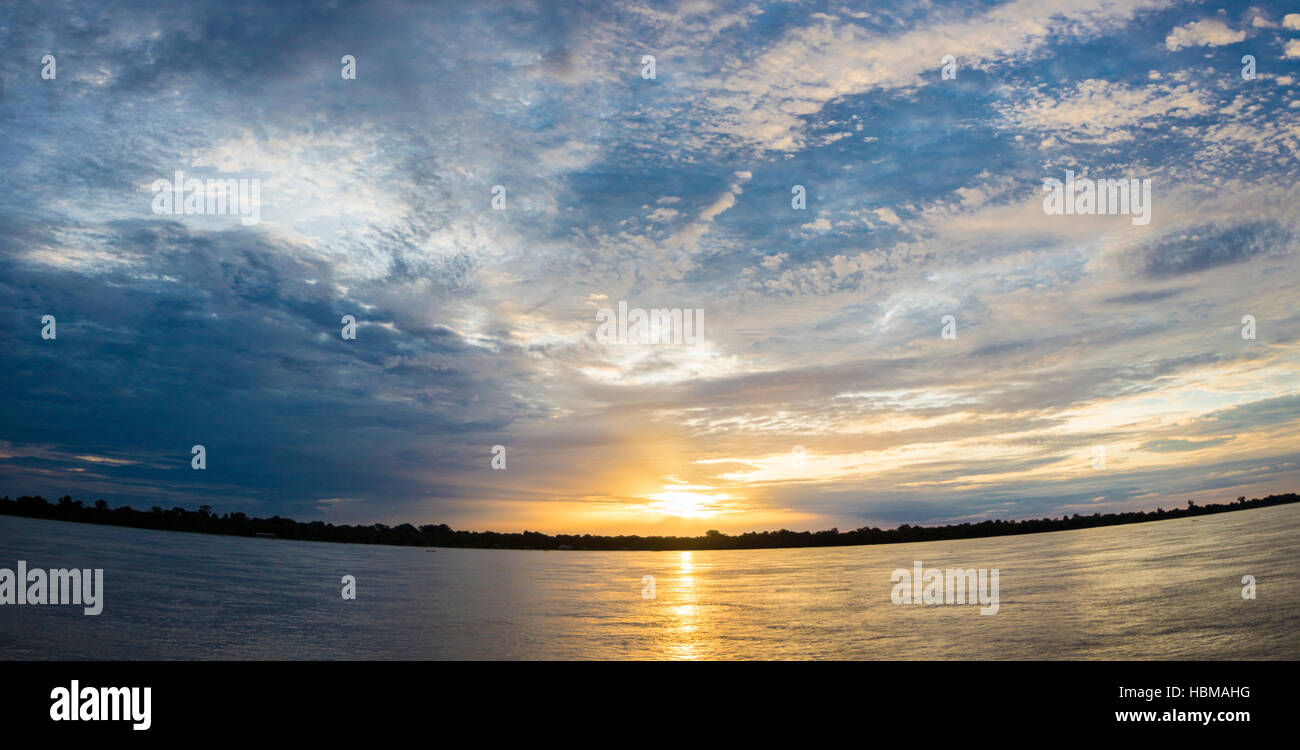 Colorful sunset on the river Amazon in the rainforest, Brazil Stock ...