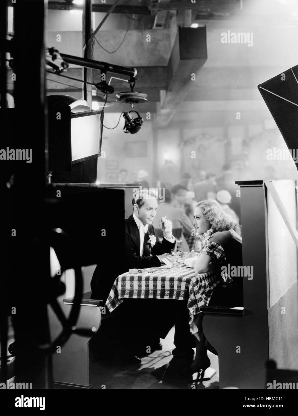 DANCING LADY, from left: Franchot Tone, Joan Crawford filming on set ...