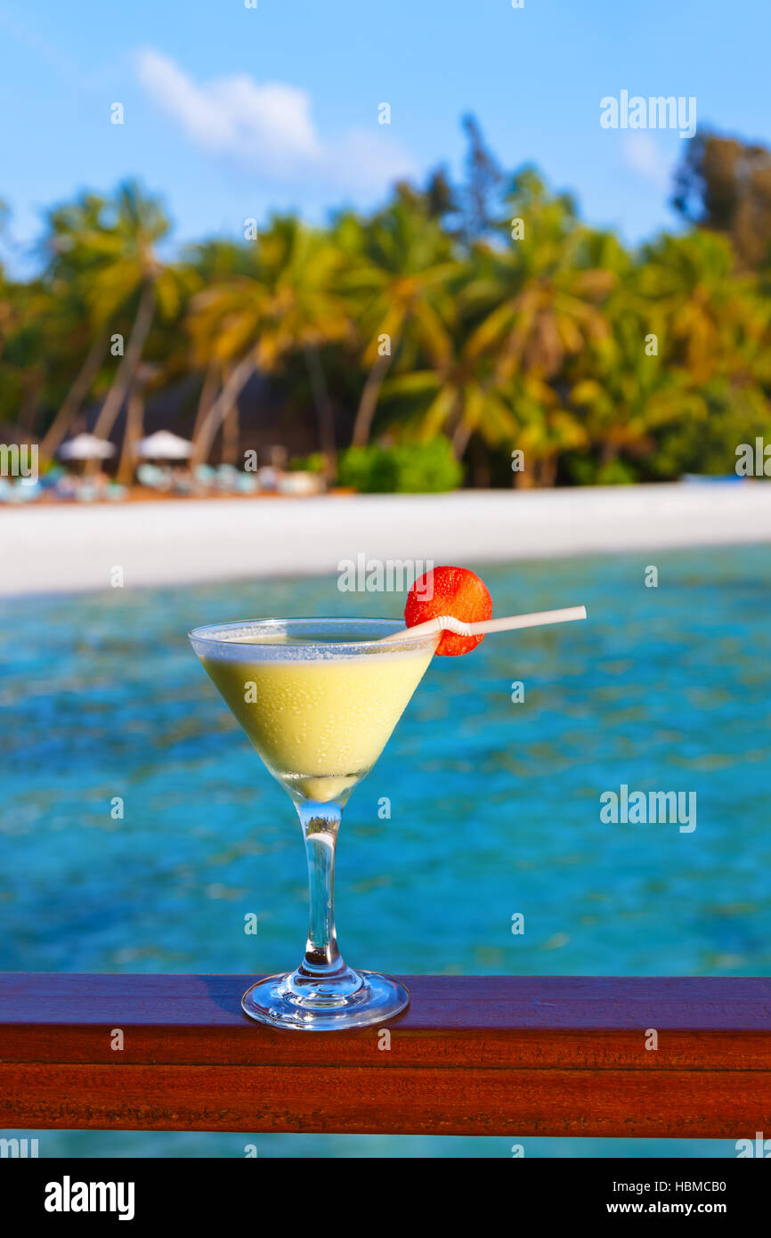 Fruit cocktail on Maldives beach Stock Photo - Alamy