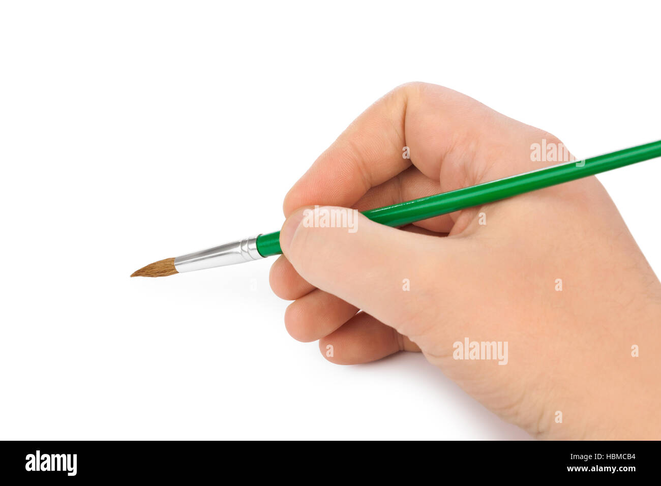 Hand with paintbrush Stock Photo - Alamy
