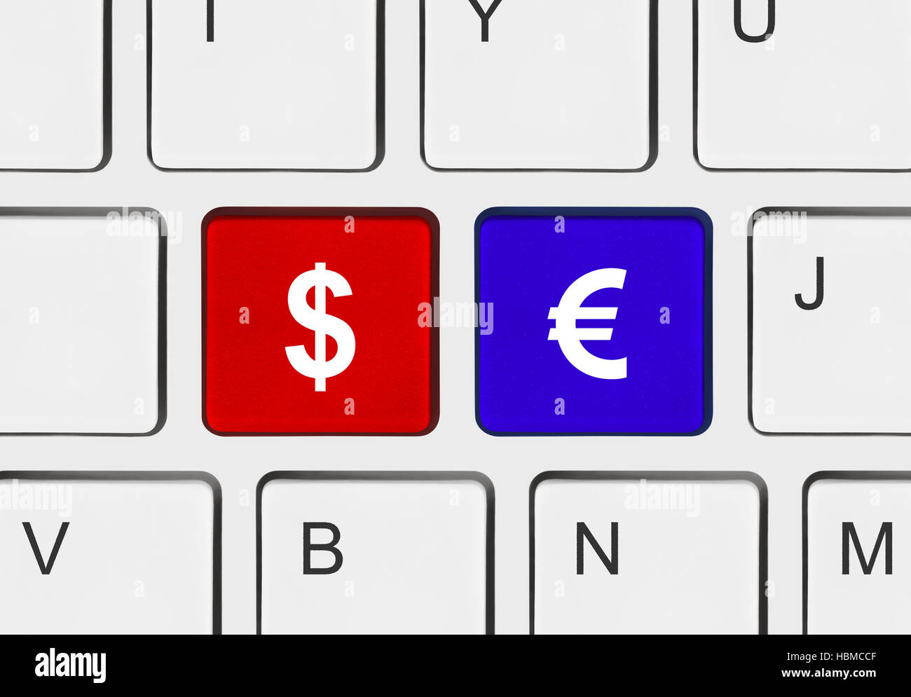 Computer keyboard with two money keys Stock Photo - Alamy
