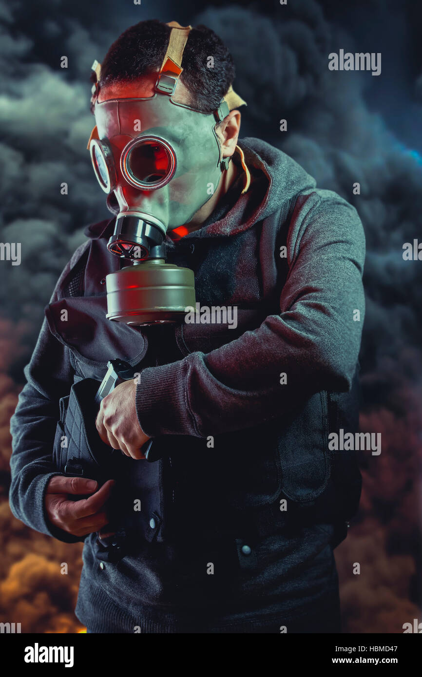 Police man with gas mask over explosion background Stock Photo - Alamy