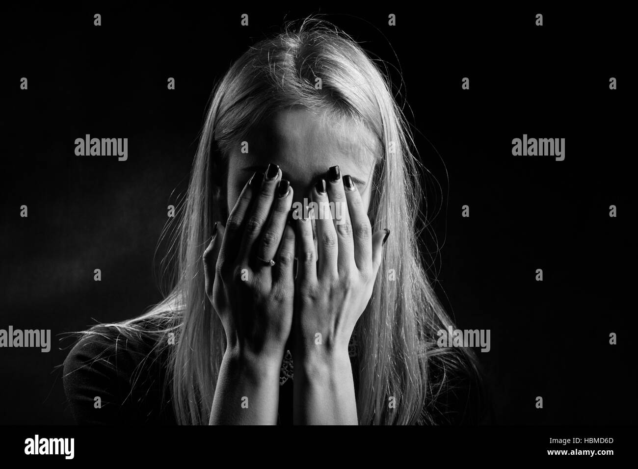 Girl with hair covering face Black and White Stock Photos & Images - Alamy
