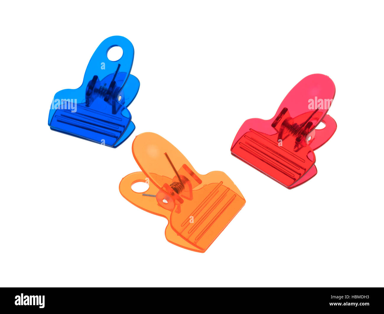 Three colorful plastic clips isolated on a white background Stock Photo ...