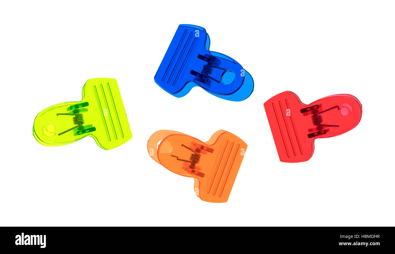 A group of colorful plastic clips isolated on a white background top ...