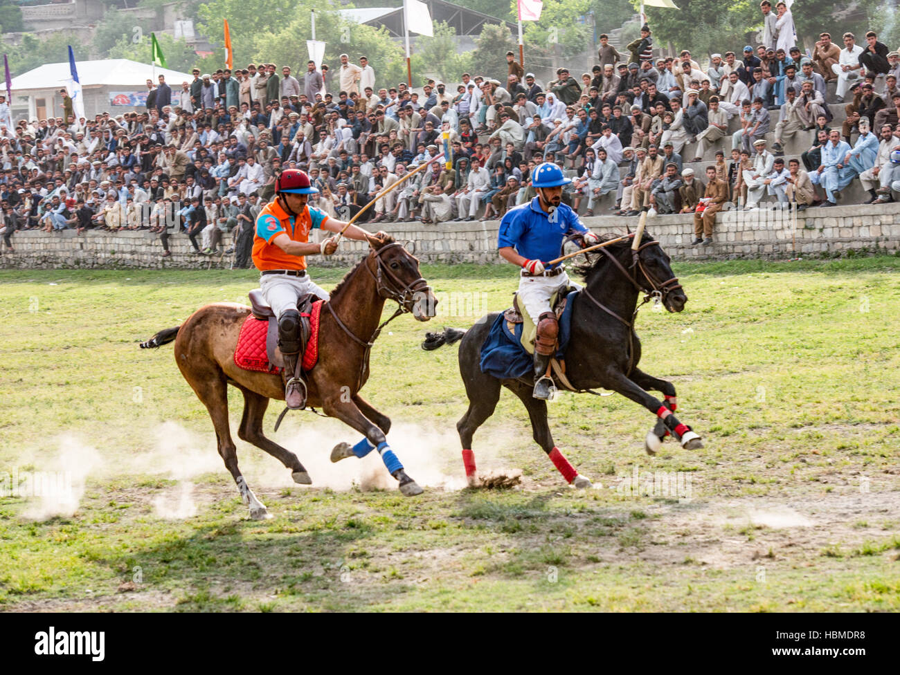 Free-style mountain polo being played on the Chitral Polo Ground Stock ...